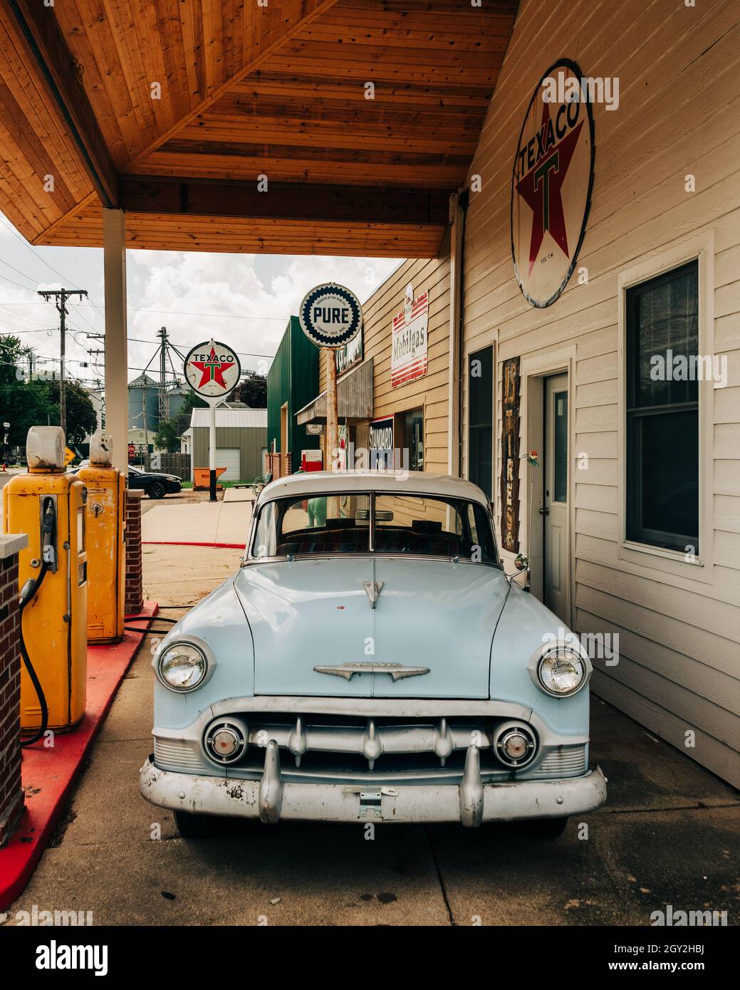 Old gas pumps and vintage car at Franks Old Station, on Route 66 in ...
