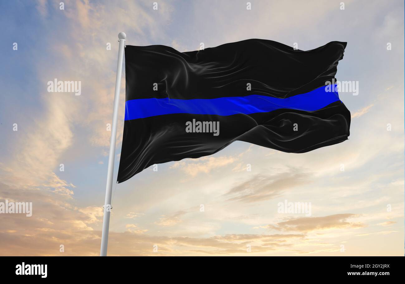 Thin Blue Line flag waving at cloudy sky background on sunset ...