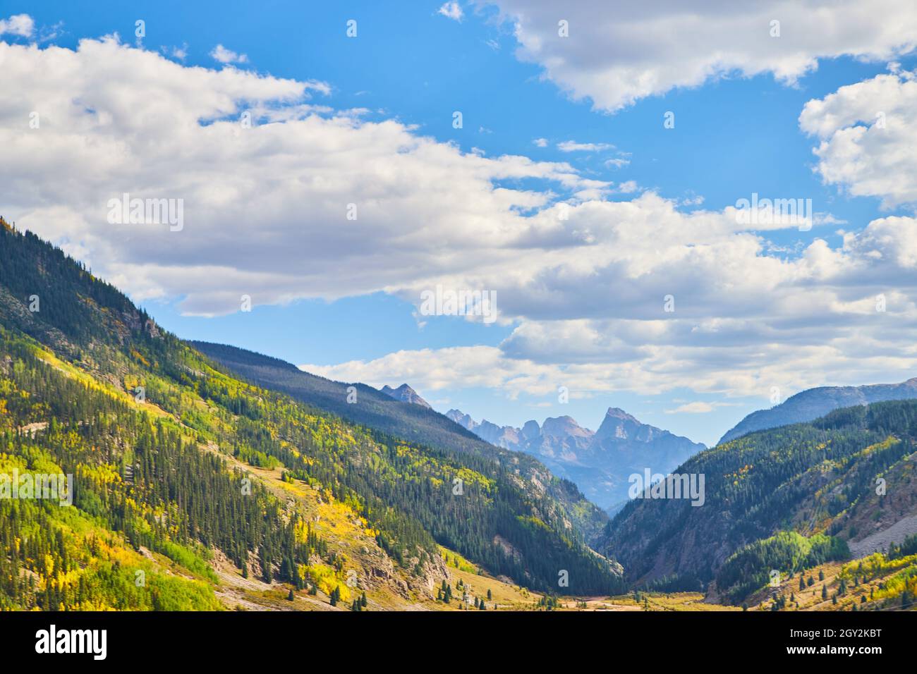 Bottom of valley surrounded by vast mountains Stock Photo - Alamy