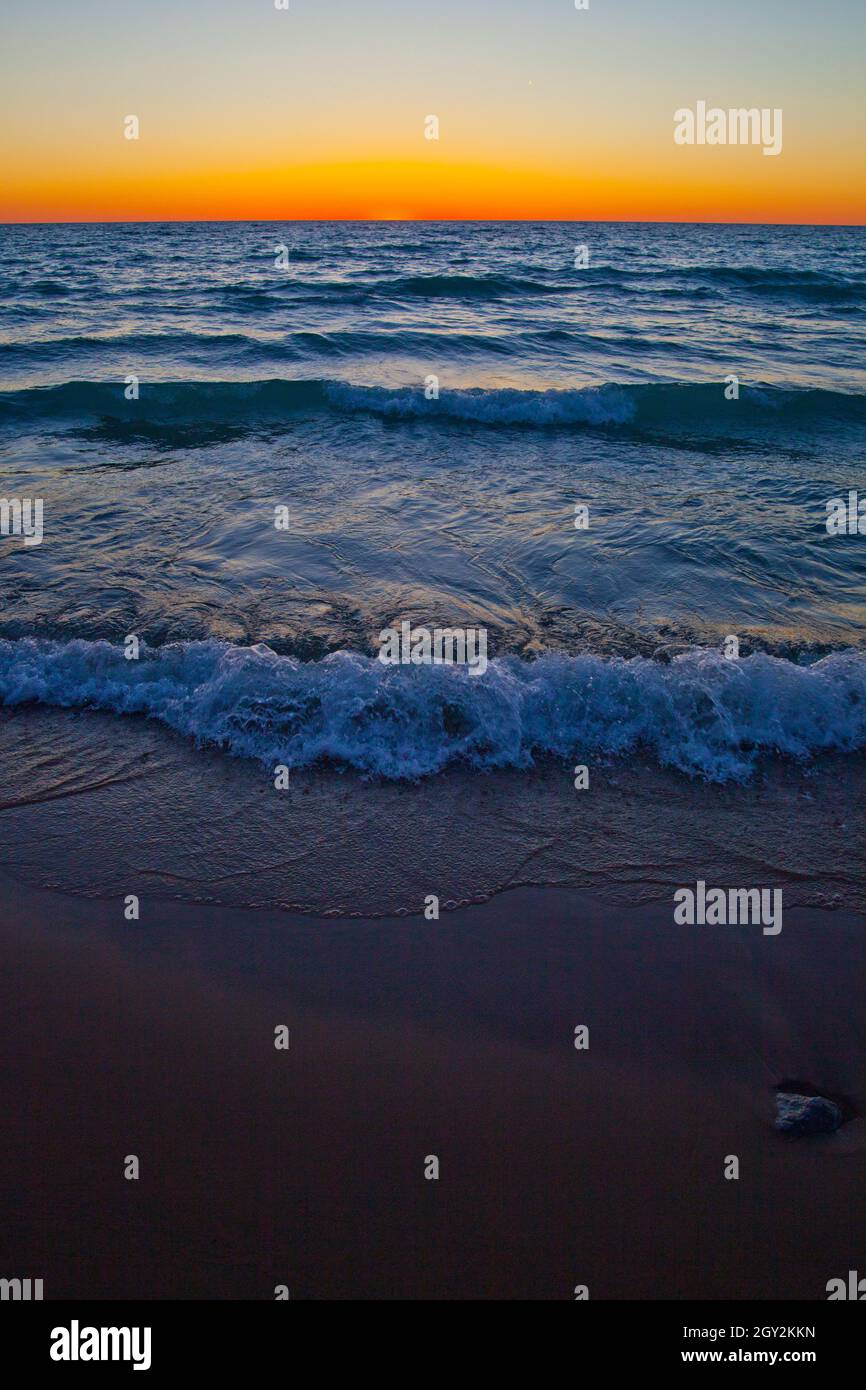 Sandy shore at sunset hi-res stock photography and images - Alamy