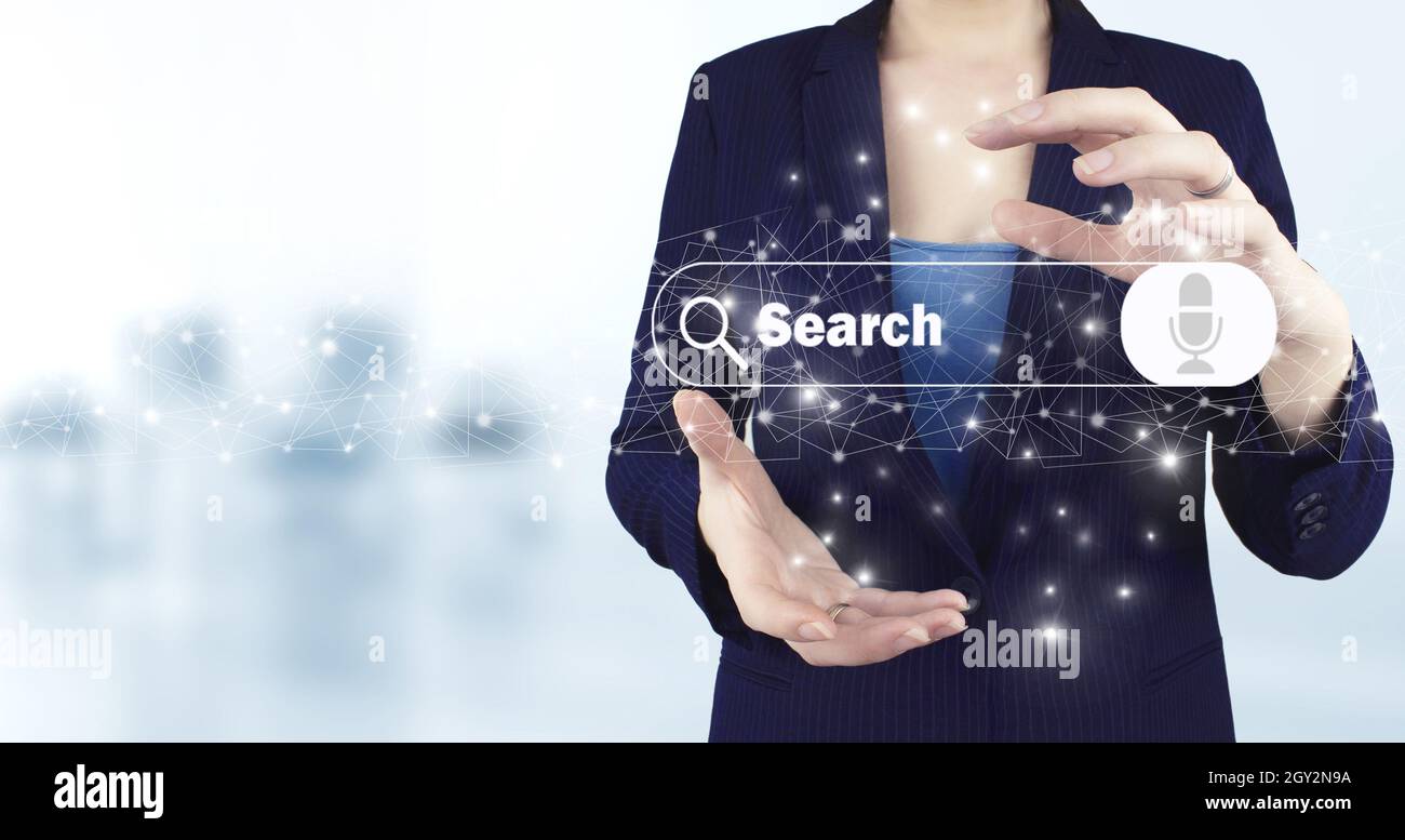 Searching Internet Data. Web Browsing Concept. Two hand holding virtual holographic search data ...