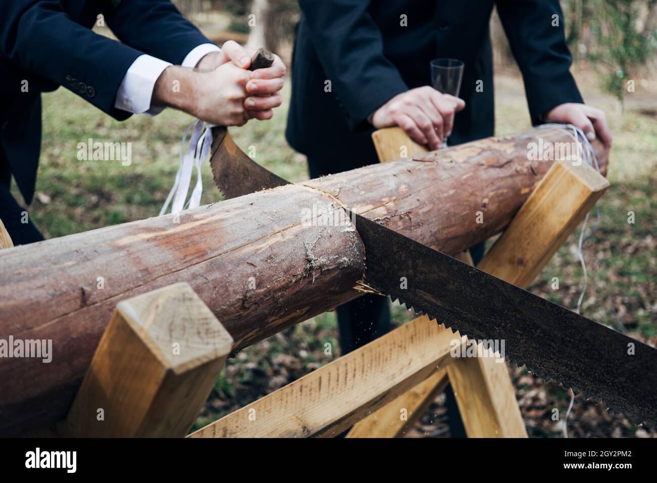 Wood column being cut Stock Photo - Alamy