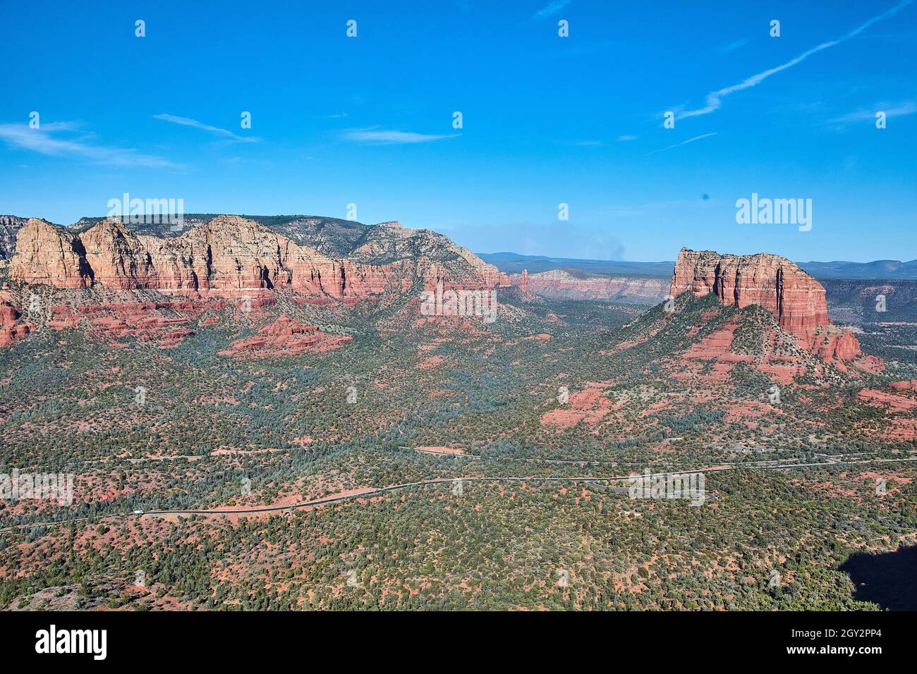 Aerial of desert landscape with large red rock mountains Stock Photo ...