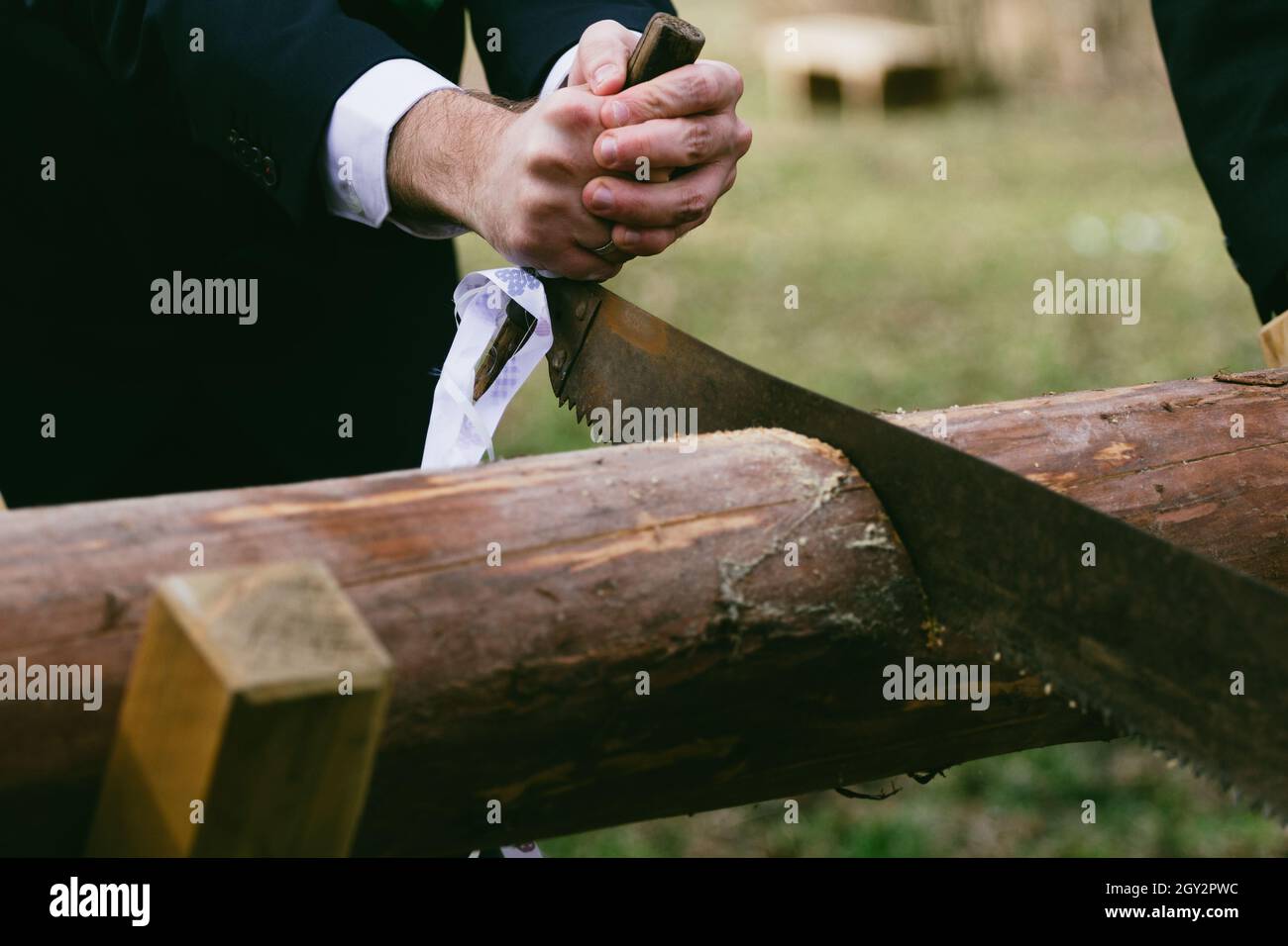 Wood column being cut Stock Photo - Alamy