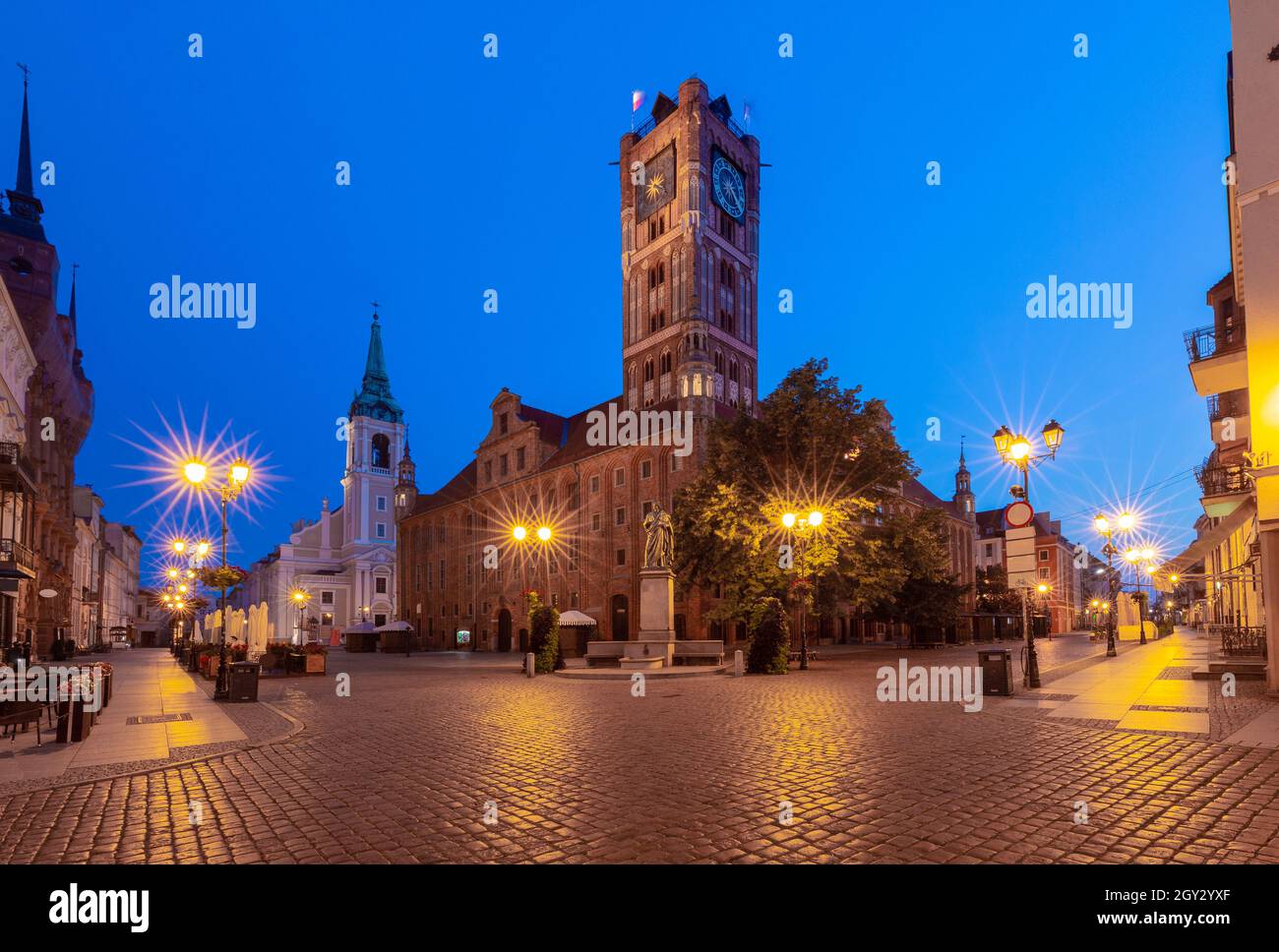 The Old Market Square and the City Hall at night. Torun. Poland Stock ...