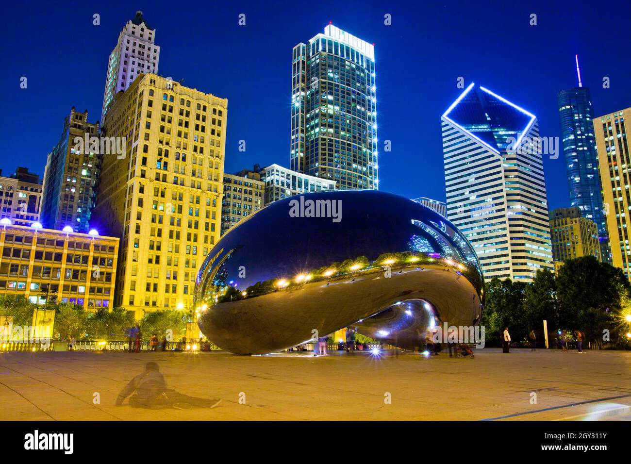 The Bean at an angle with Chicago skyscrapers in the background at ...