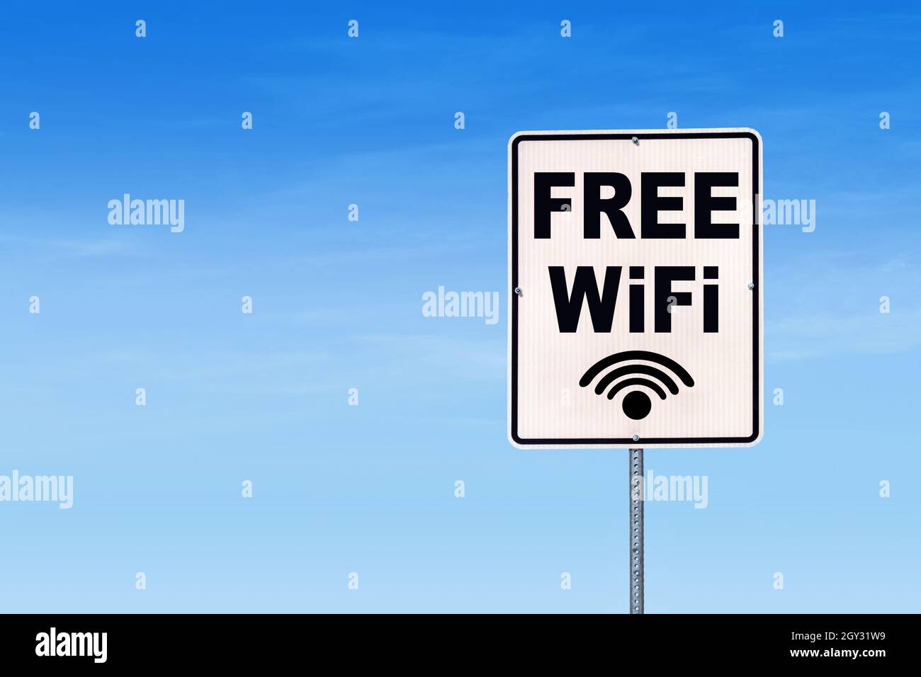 Free WiFi street sign with blue background Stock Photo - Alamy