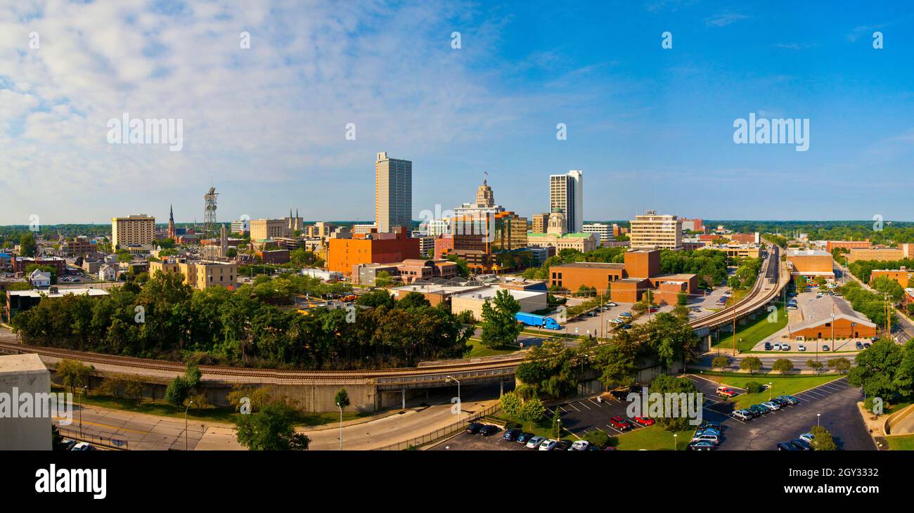Panoramic skyline of Fort Wayne with buildings and trees and roads ...