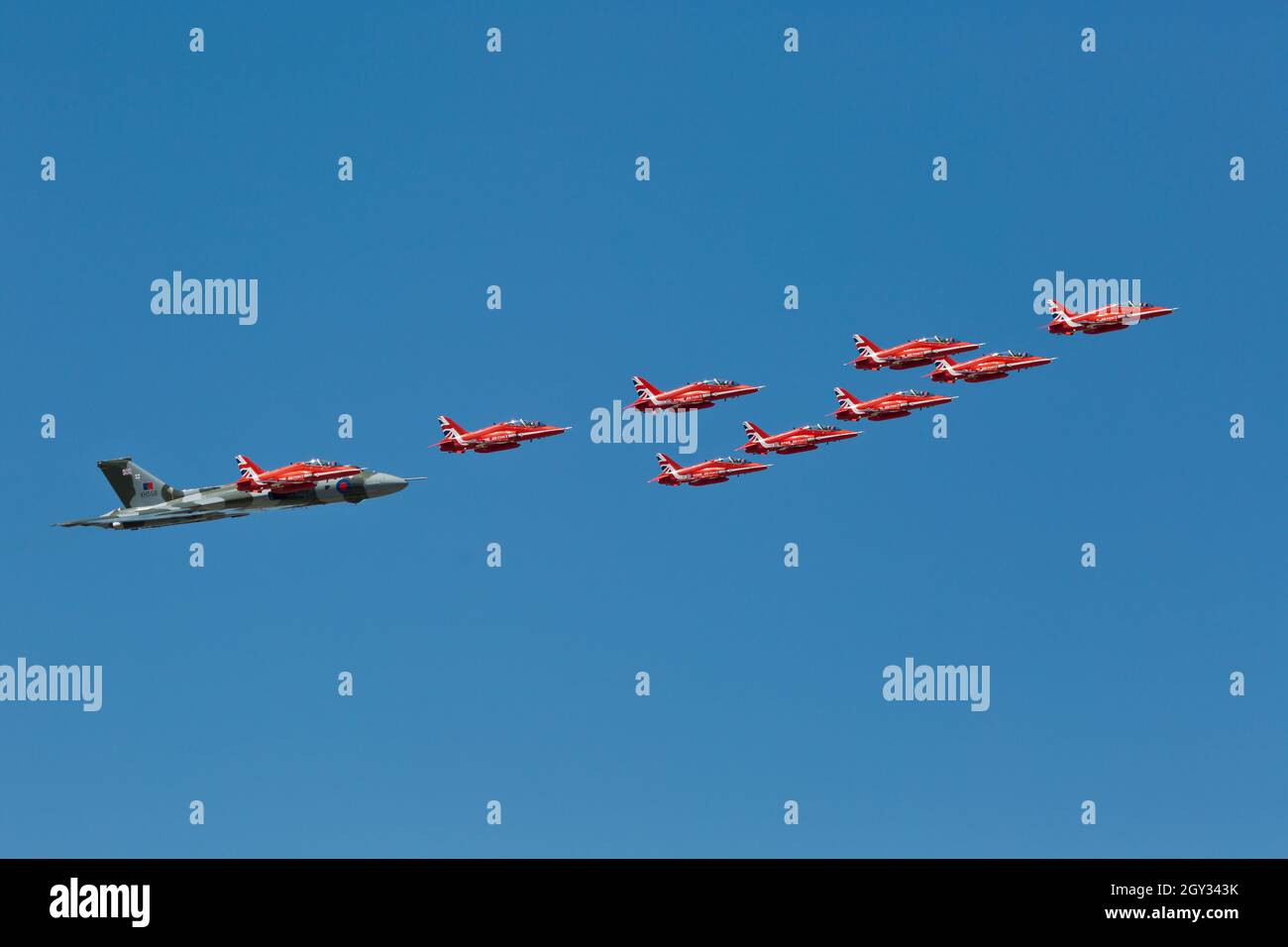 Vulcan Bomber in formation with the Red Arrows Stock Photo - Alamy