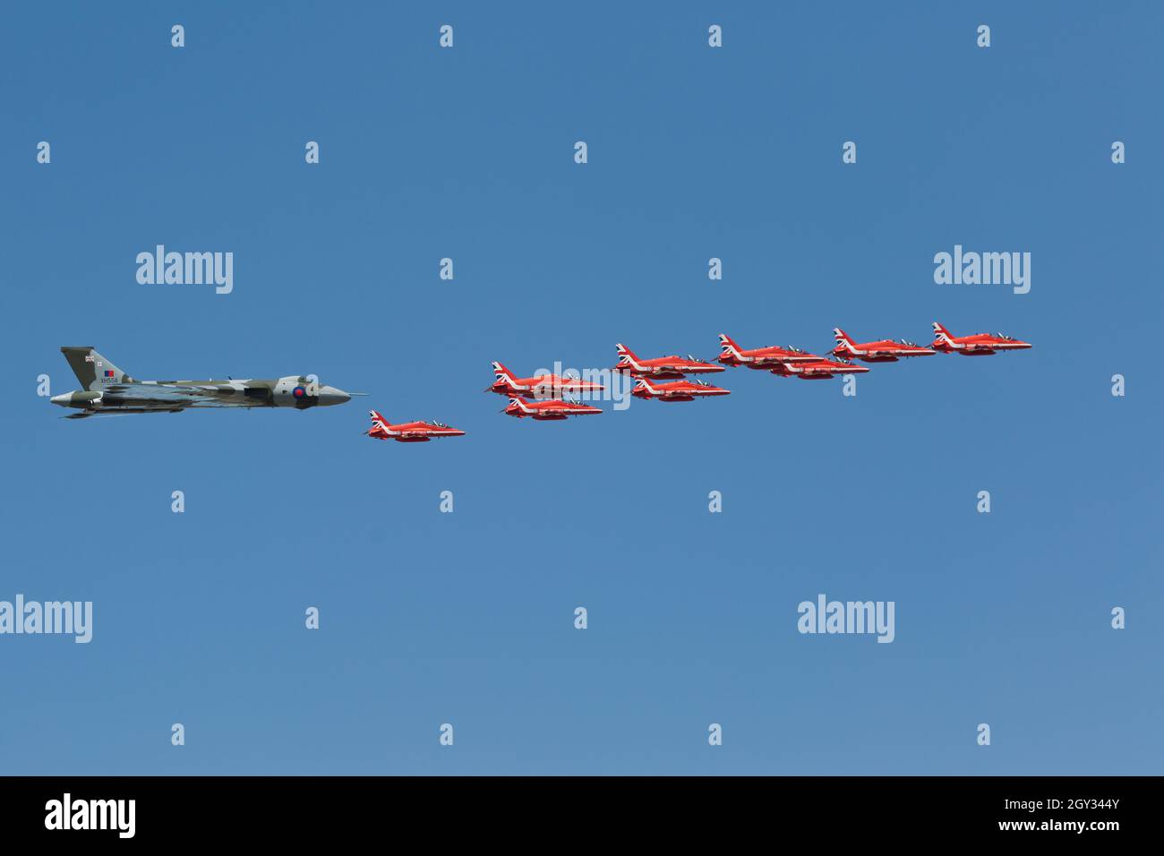 Vulcan Bomber in formation with the Red Arrows Stock Photo - Alamy