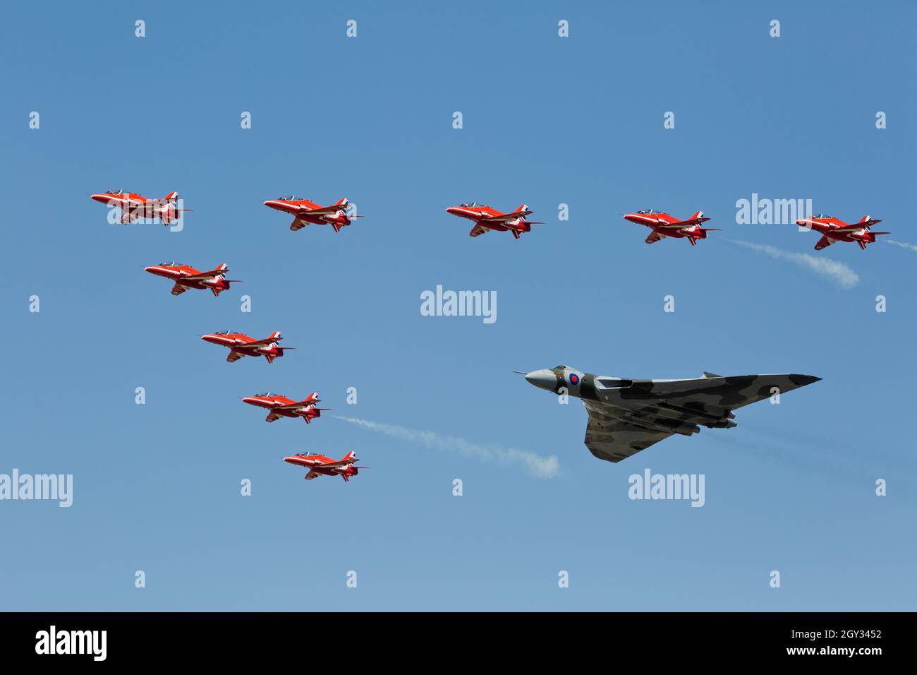 Vulcan Bomber in formation with the Red Arrows Stock Photo - Alamy