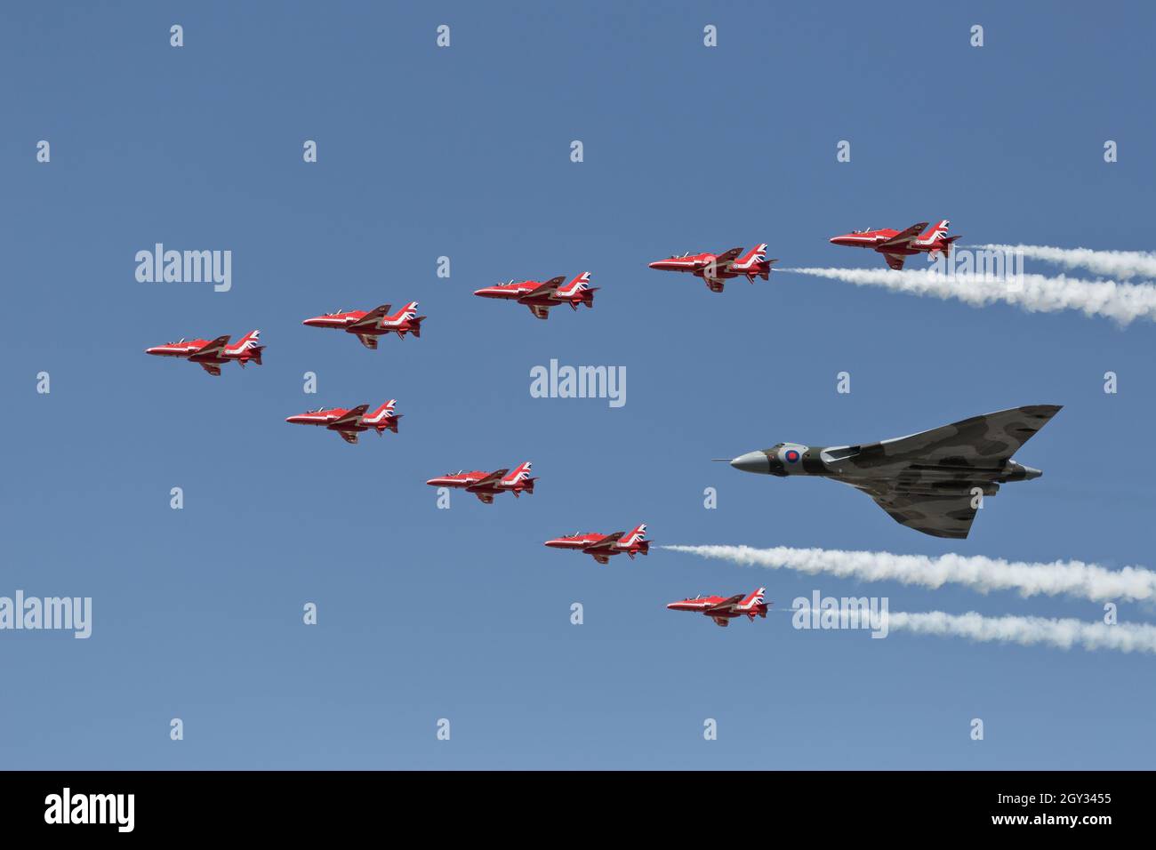 Vulcan Bomber in formation with the Red Arrows Stock Photo - Alamy
