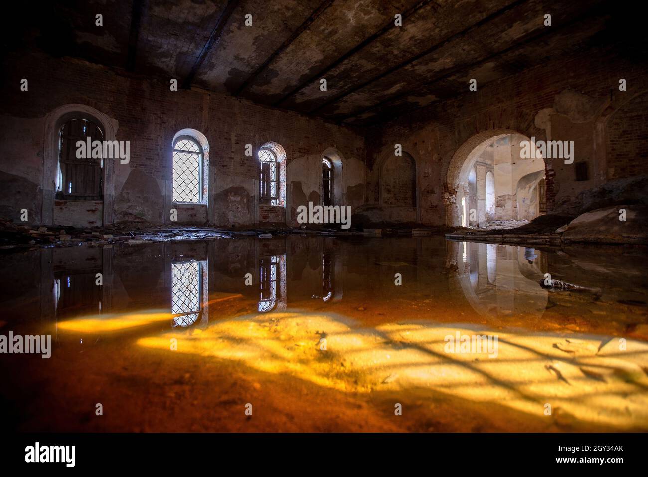 Large flooded hall of ruined abandoned church Stock Photo - Alamy