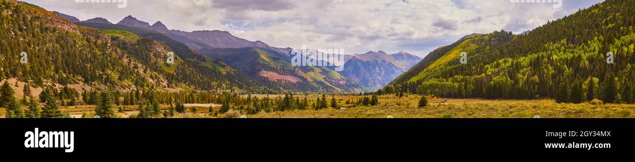 Panorama of vast valley surrounded by mountains Stock Photo - Alamy
