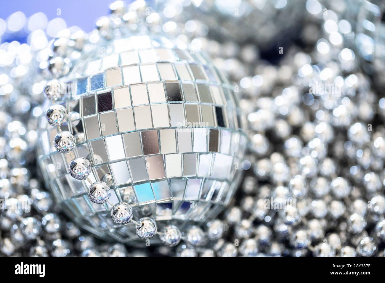 Sparkling disco ball in a day light. Concept of party Stock Photo - Alamy