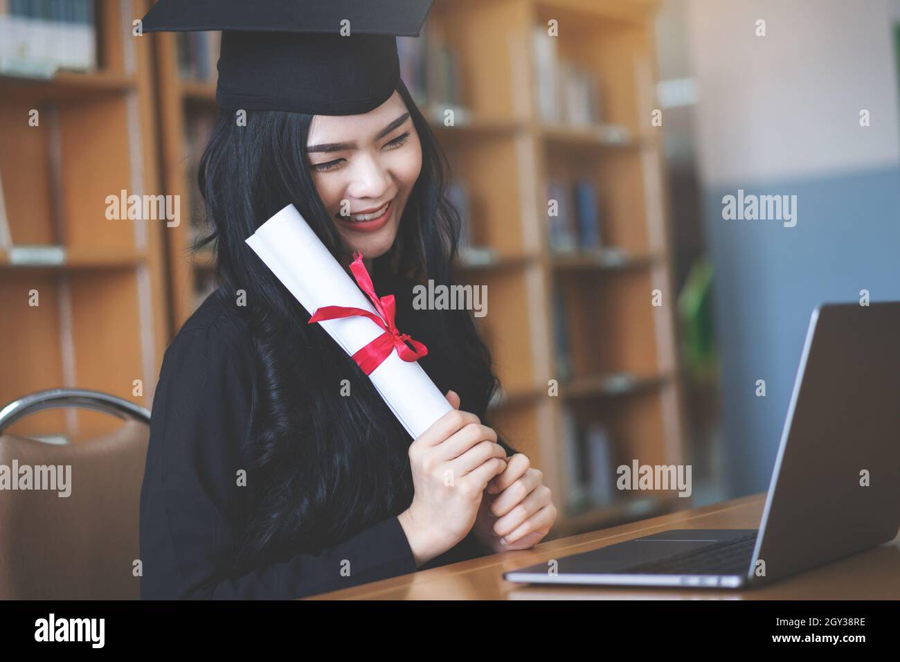 Young university student expressing joy and excitement for graduation ...