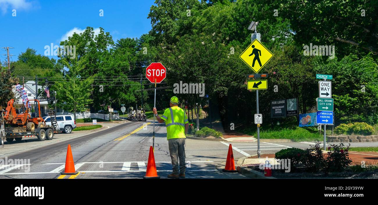 Traffic Control at Street Paving Stock Photo - Alamy