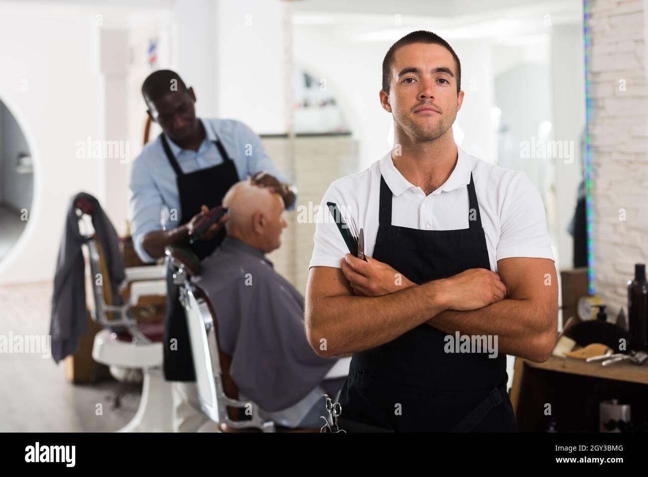 Successful professional barber Stock Photo - Alamy