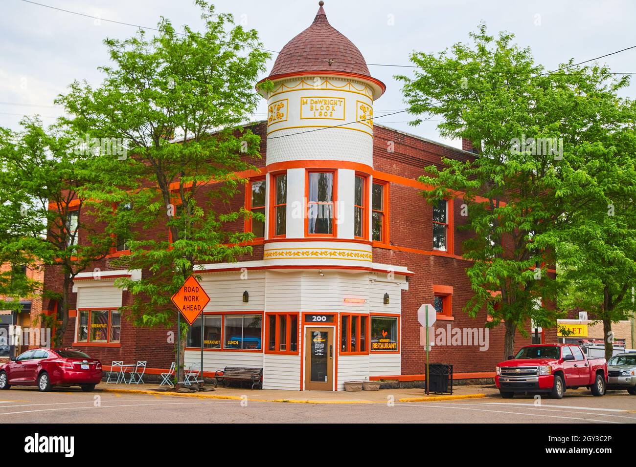 Small town architecture of orange and brick building Stock Photo - Alamy