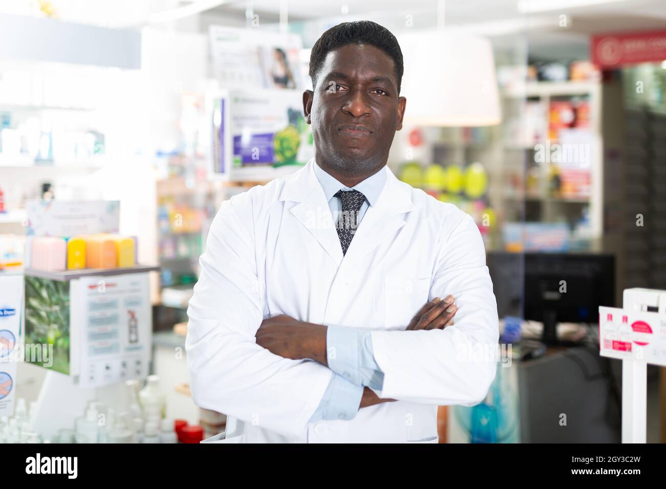 Portrait of pharmacist in gown Stock Photo - Alamy
