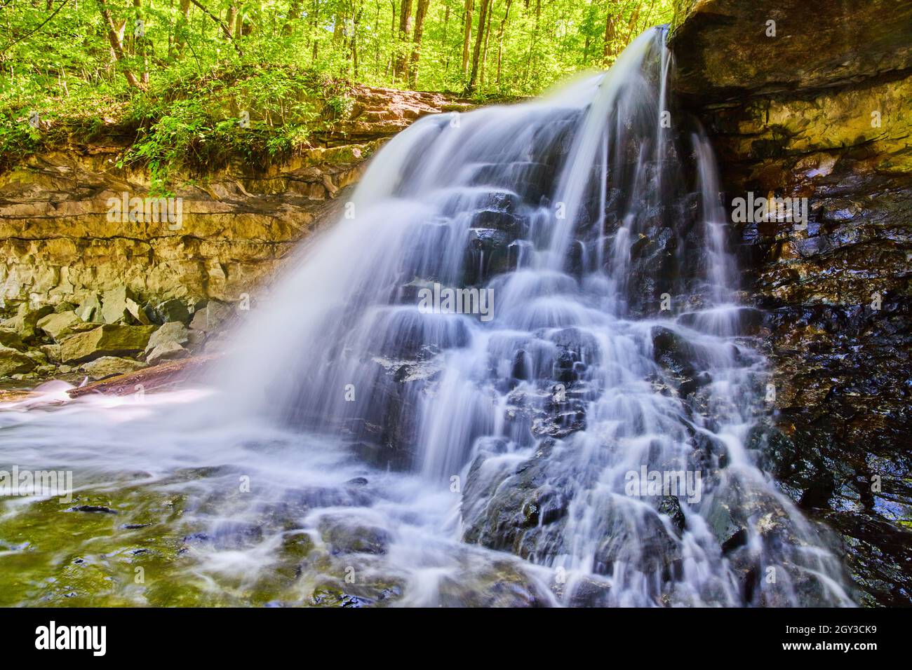 Landscape of white waterfall cascading over rocks up close Stock Photo ...