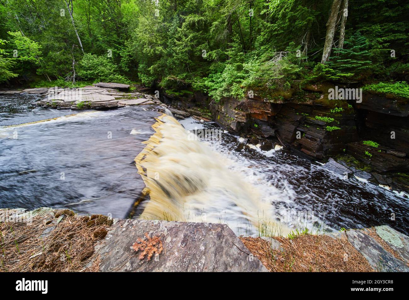 Large waterfall in gorge with sharp cliffs Stock Photo - Alamy