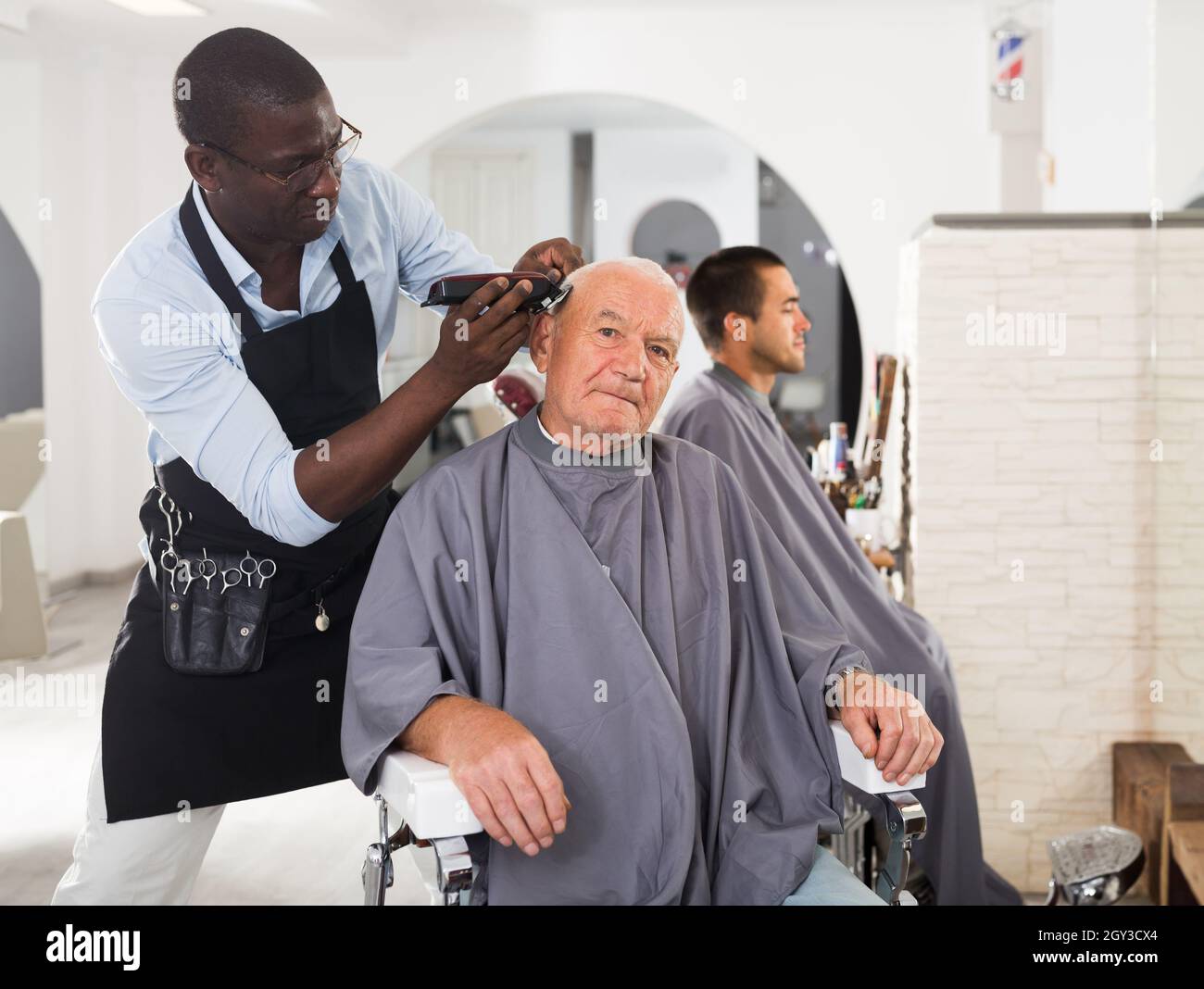 Man getting haircut from hi-res stock photography and images - Alamy