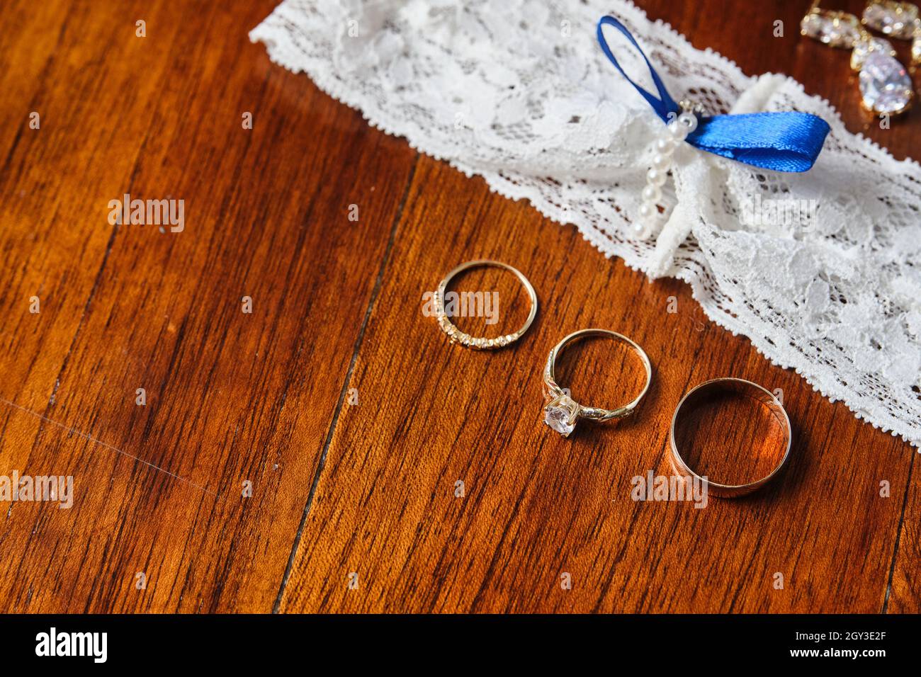 Garter wedding rings hi-res stock photography and images - Alamy