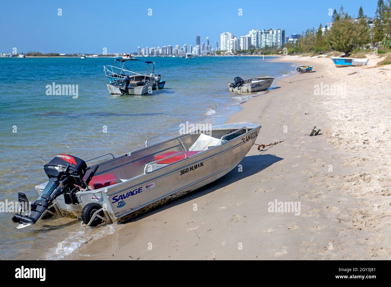Boats on the beach at Labrador, Gold Coast Stock Photo - Alamy