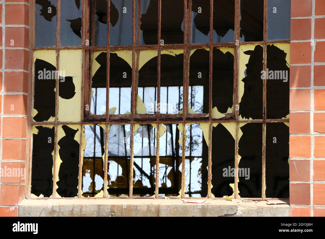 Derelict, abandoned brick warehouse with smashed windows Stock Photo ...