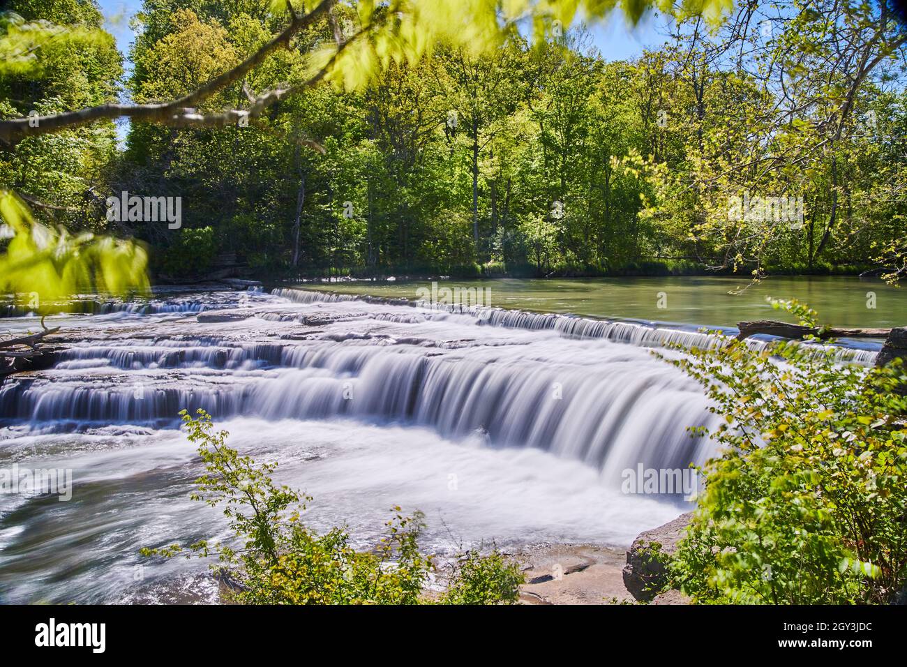Large cascading waterfalls in the forest Stock Photo - Alamy