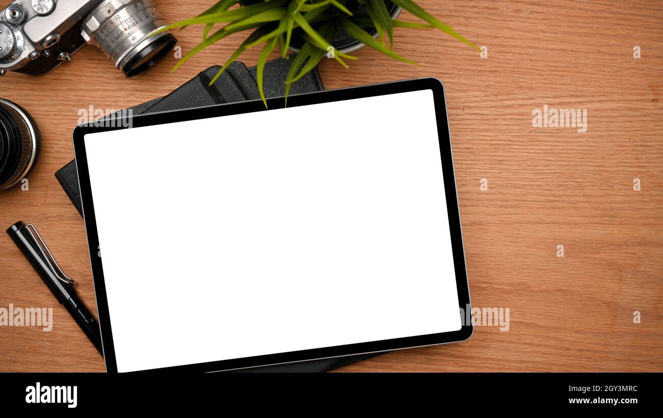 A Modern photographer desk with graphic tablet mockup for montage ...