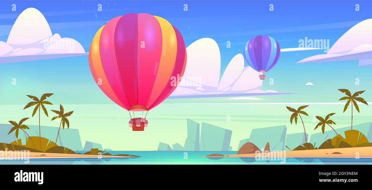 Hot air balloons flying in sky above tropical island with palm trees in ...