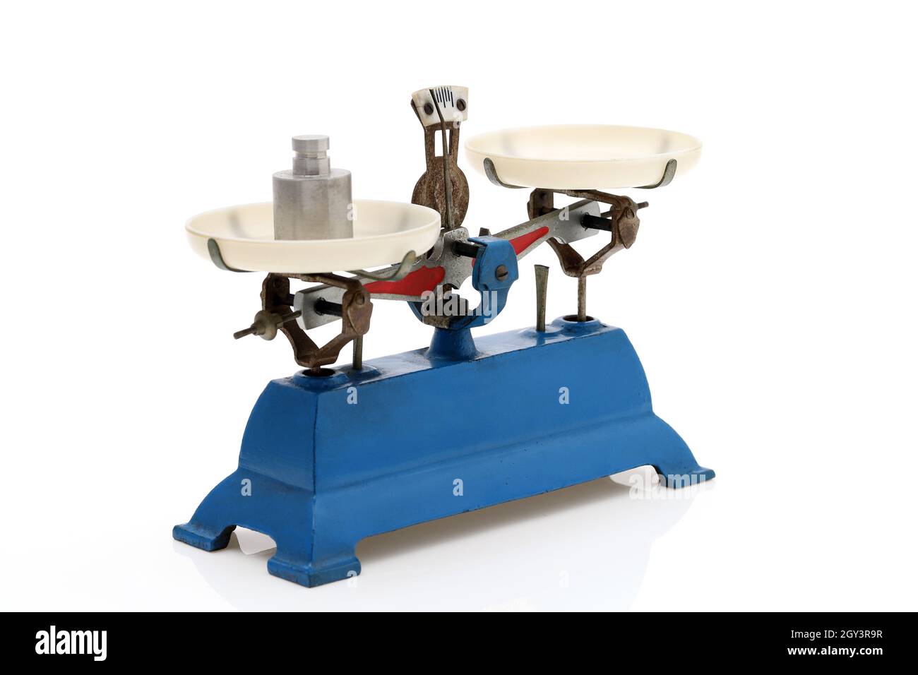 Retro roberval balance with weight, scale isolated on a white ...