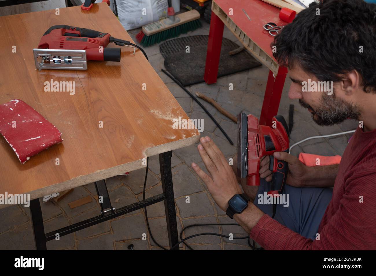 man using power tools Stock Photo - Alamy