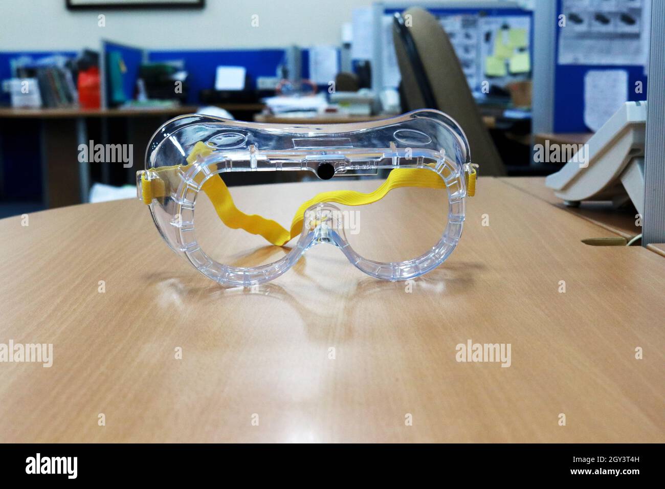 Goggles with clear lenses that are usually used by medical workers to ...