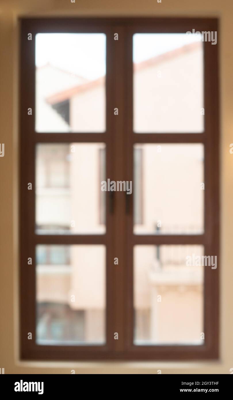 Out of focus. Windows frame in europe design Stock Photo - Alamy