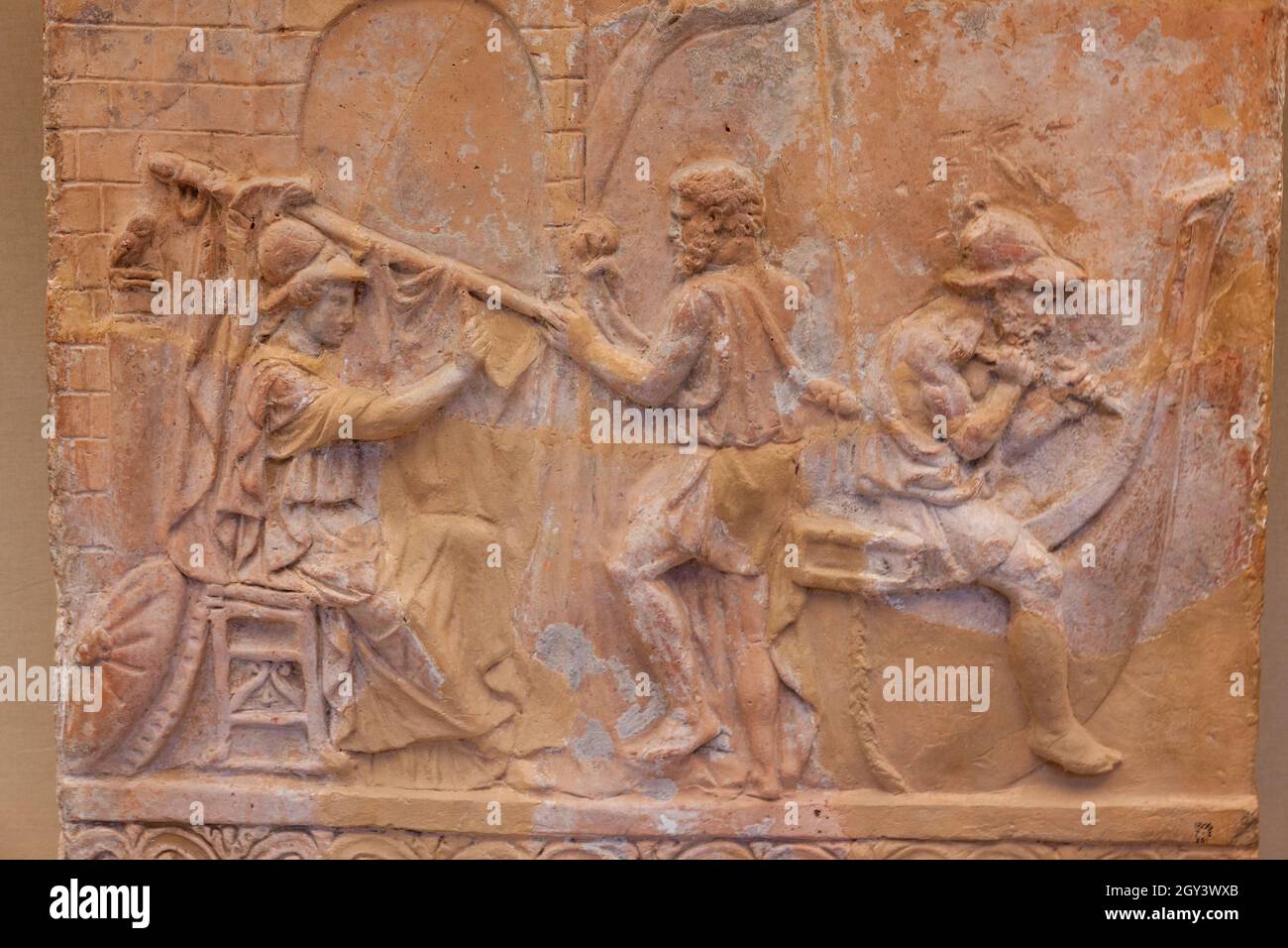 terracotta relief of Athena and Jason getting a ship ready. Historical ...
