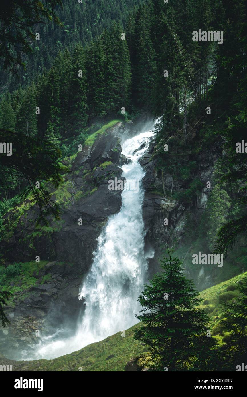 Big waterfall in the austrian alps Stock Photo - Alamy