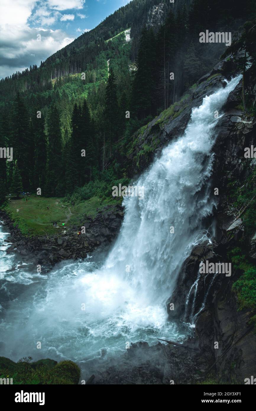 Big waterfall in the austrian alps Stock Photo - Alamy