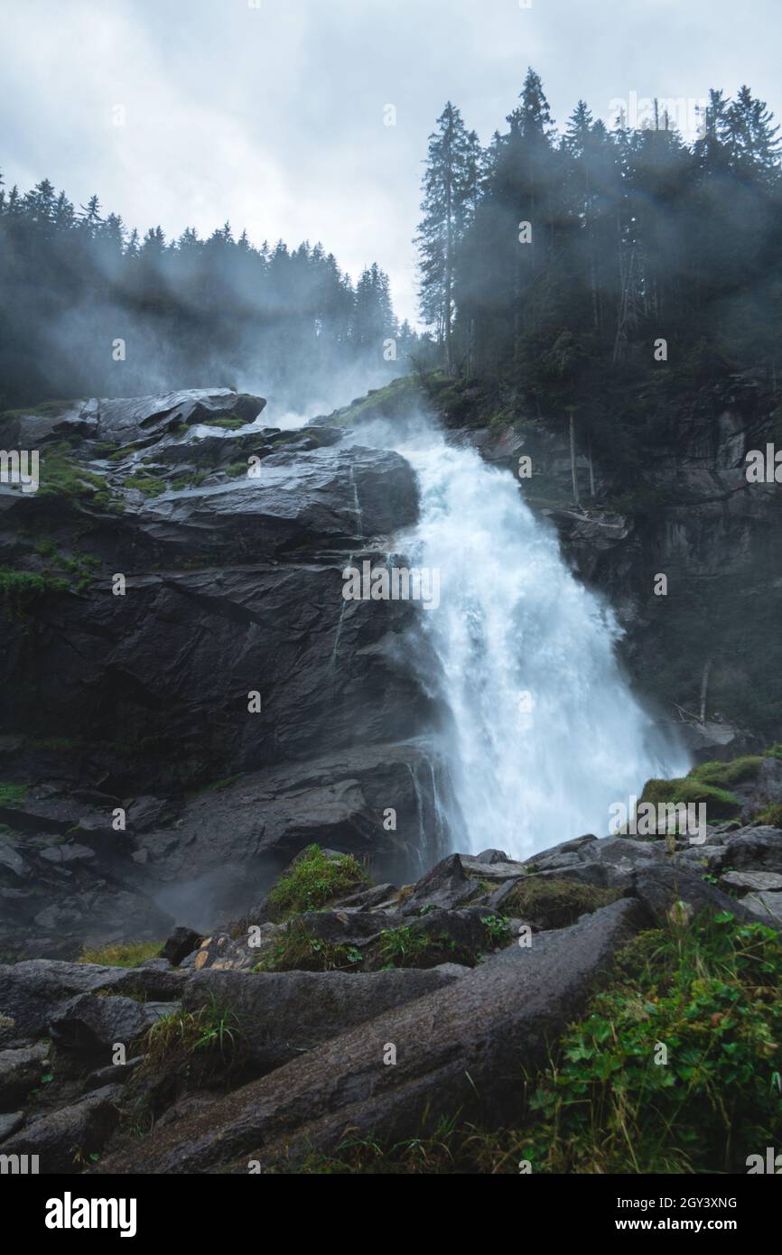 Big waterfall in the austrian alps Stock Photo - Alamy