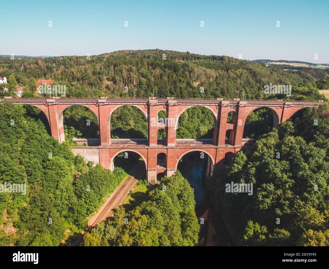 Big bridge in the middle of a forest Stock Photo - Alamy
