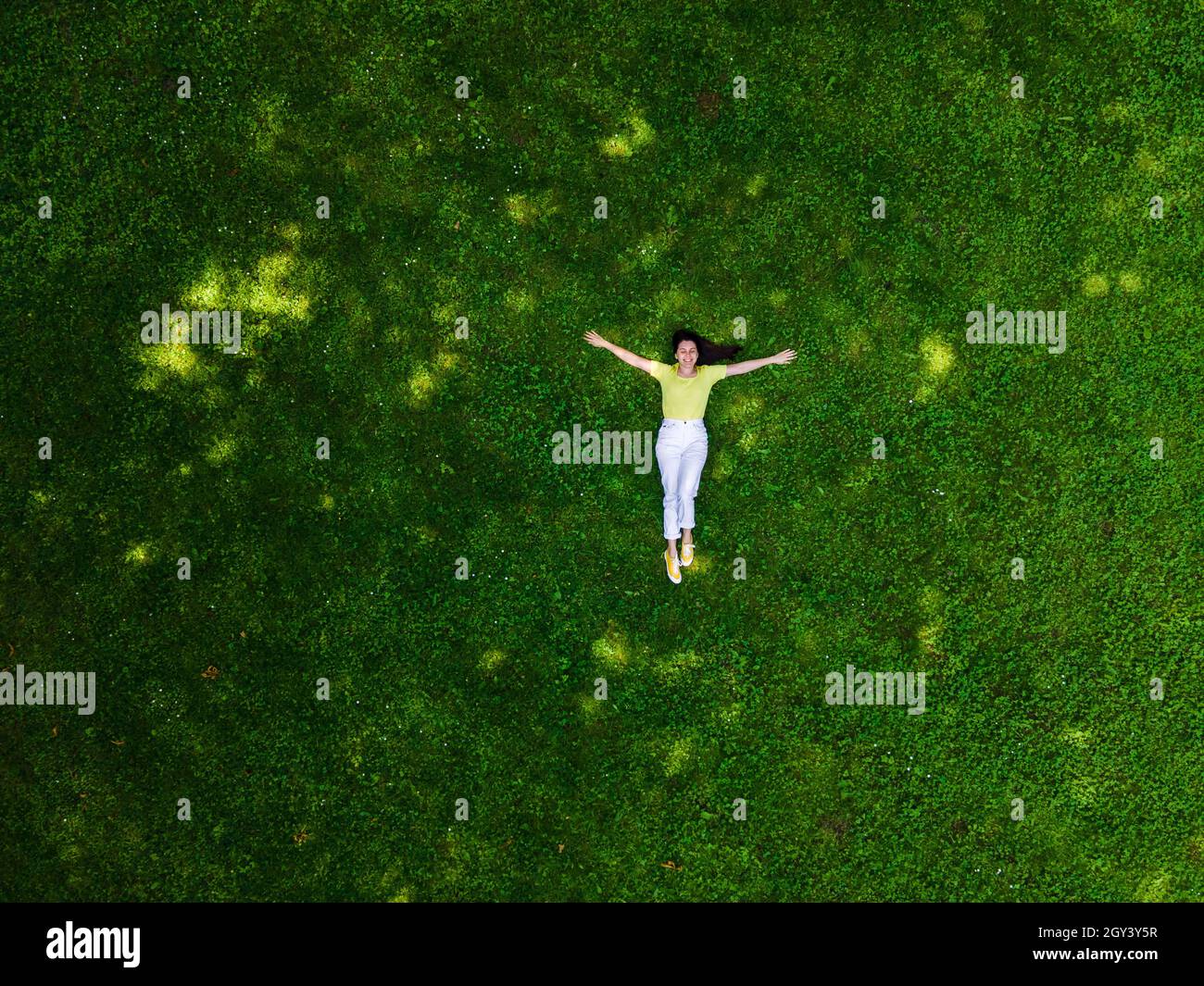 Overhead happy woman laying on hi-res stock photography and images - Alamy