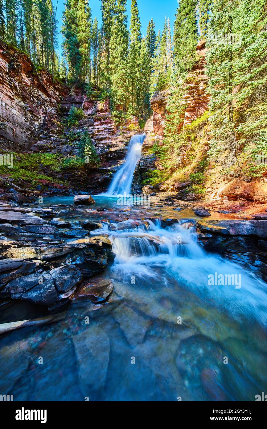 Waterfalls in colorful canyon with sunlight Stock Photo - Alamy