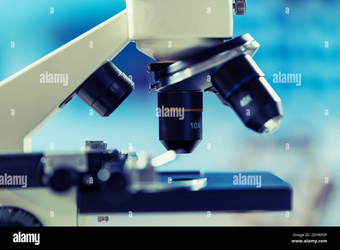 Microscope and model of chemical molecule in school class Stock Photo ...