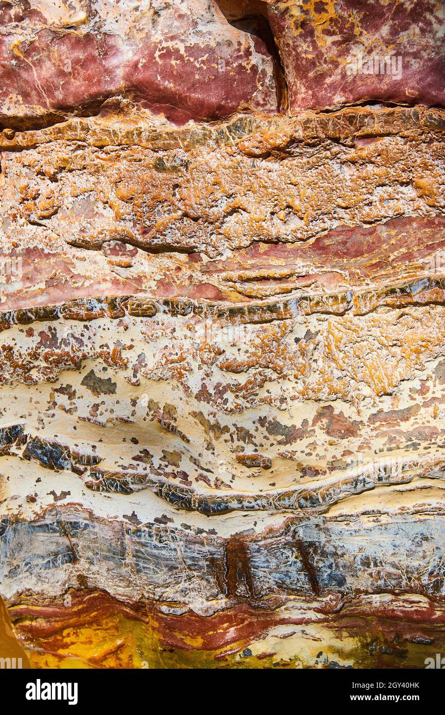 Texture detail of rock with layers of orange and red Stock Photo - Alamy