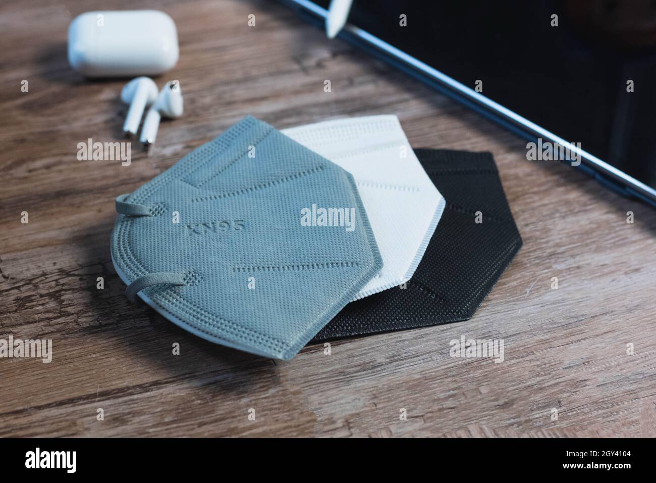 Desktop with face masks on top and office elements Stock Photo - Alamy
