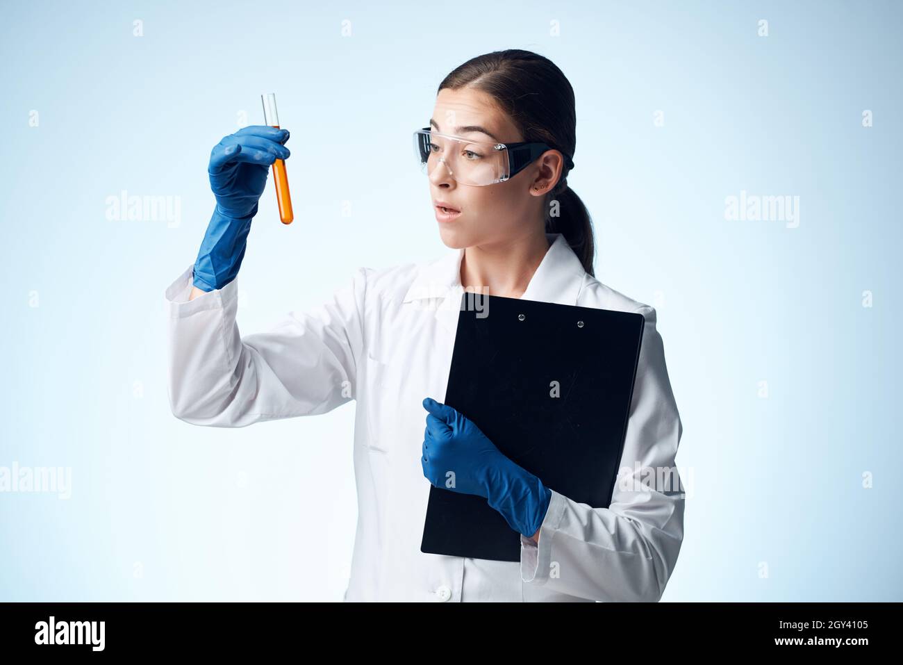 female laboratory assistant research technology experiment Professional ...
