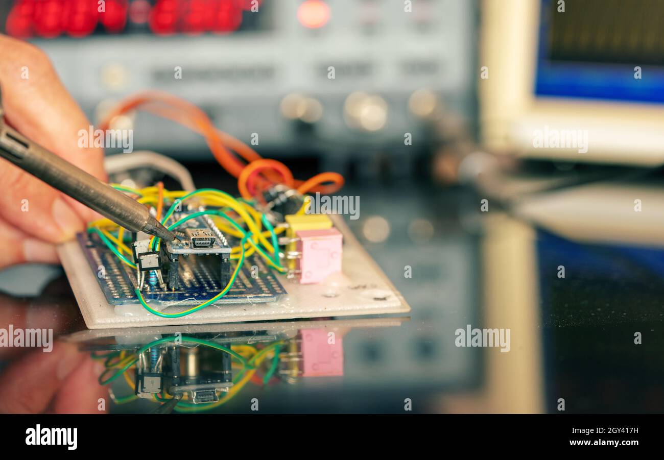 Manufacturing and setting up an electronic device in the laboratory ...