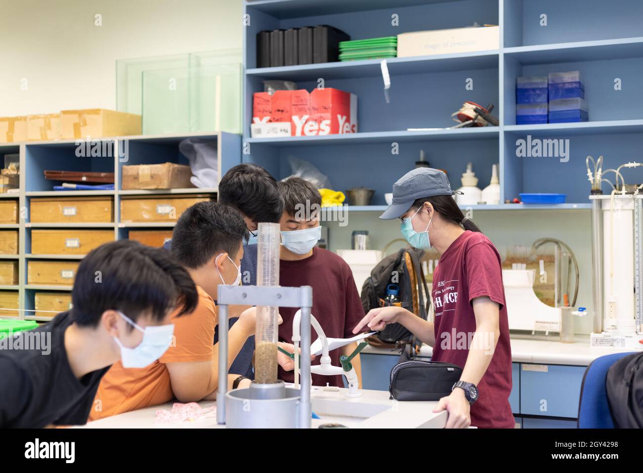 10 4 2021 Group of young students do hydraulic test of soil samples ...